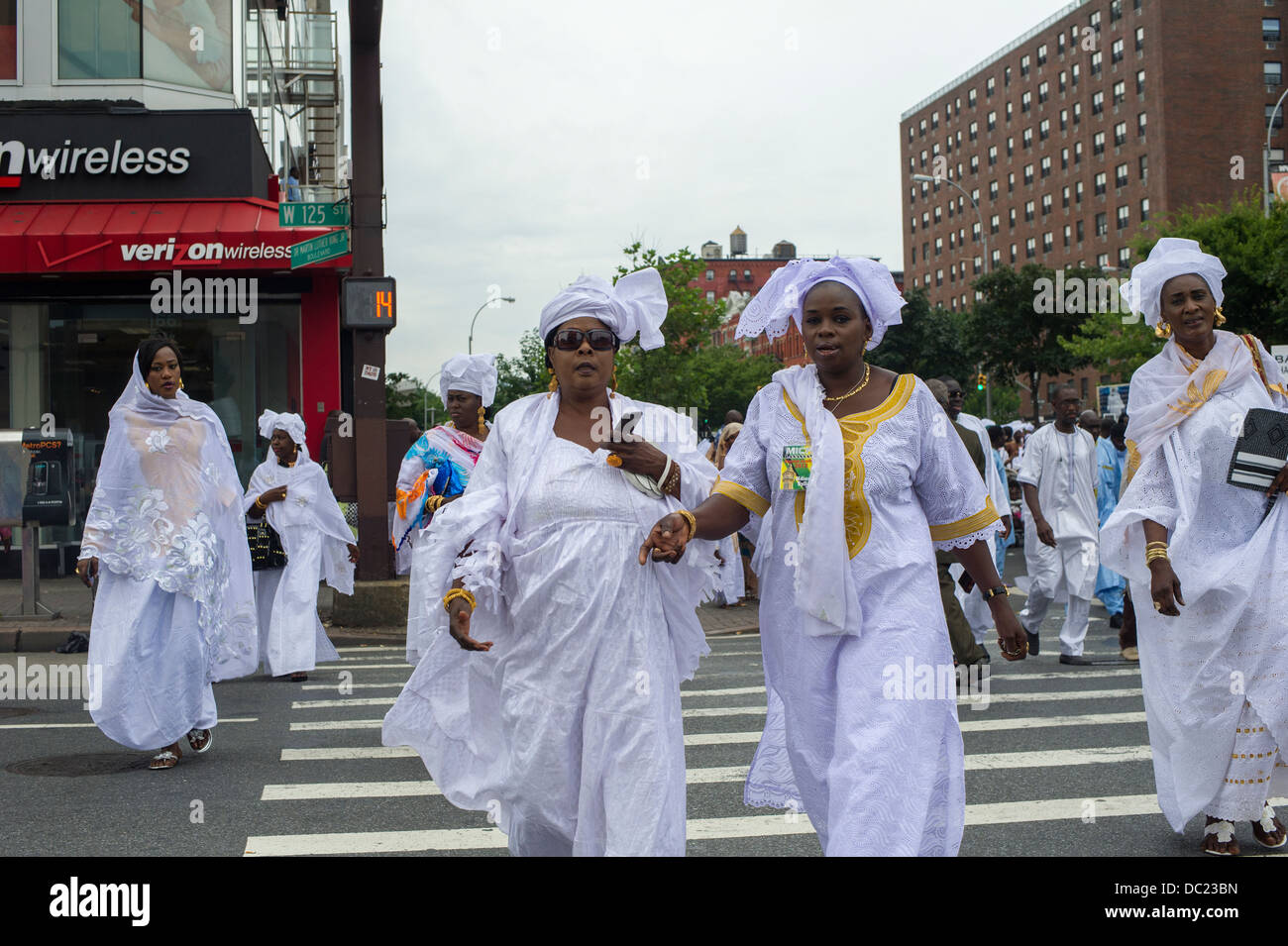 Senegalese immigrants participate in a parade in Harlem in New York ...