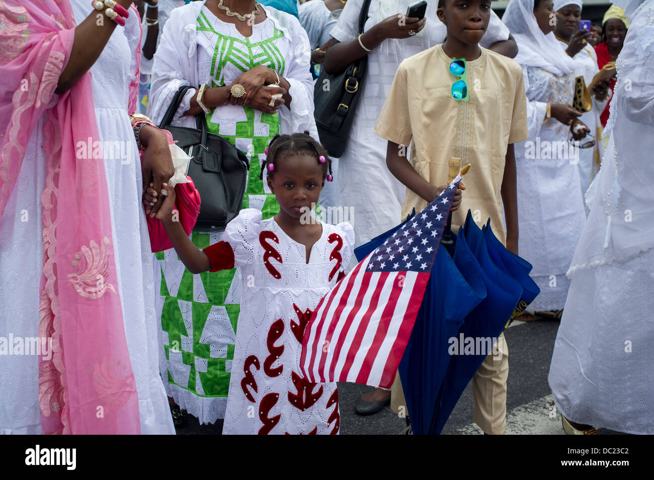 Senegalese immigrants participate in a parade in Harlem in New York ...