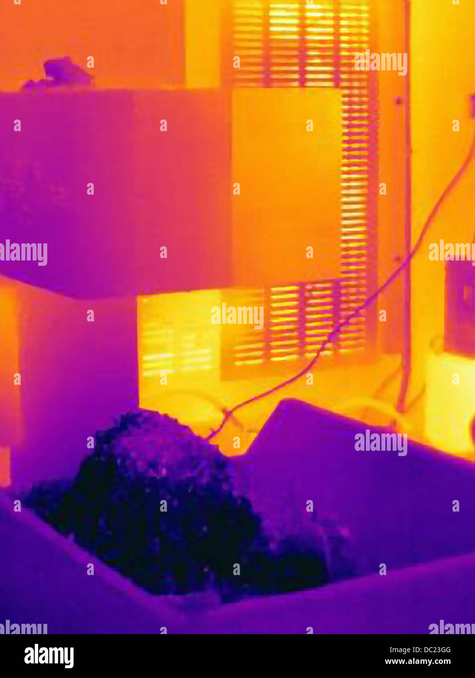 Thermal image of cold metal shavings falling from CNC machine Stock ...
