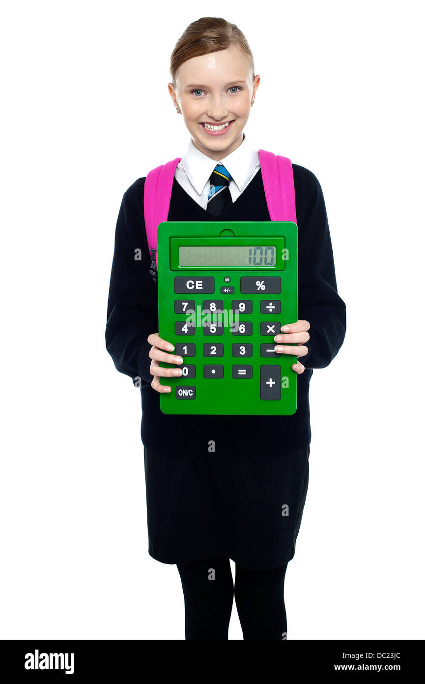 School girl holding large green calculator Stock Photo - Alamy