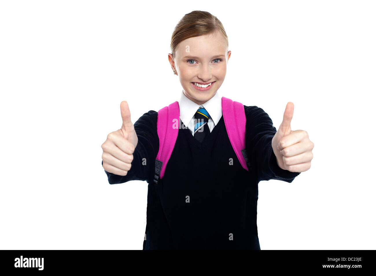 Bright student showing thumbs up sign Stock Photo - Alamy