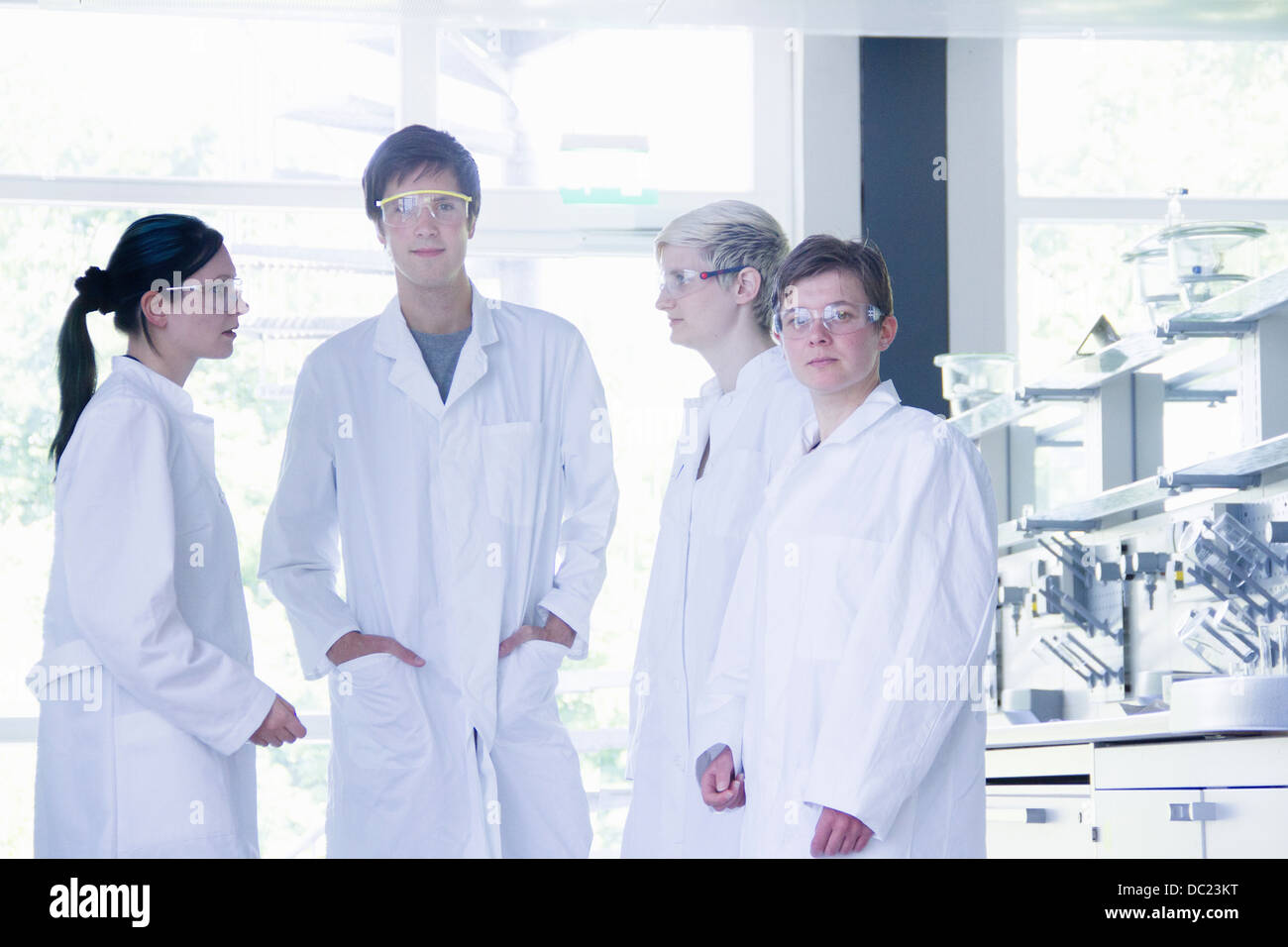 Chemistry students standing together in laboratory, portrait Stock ...