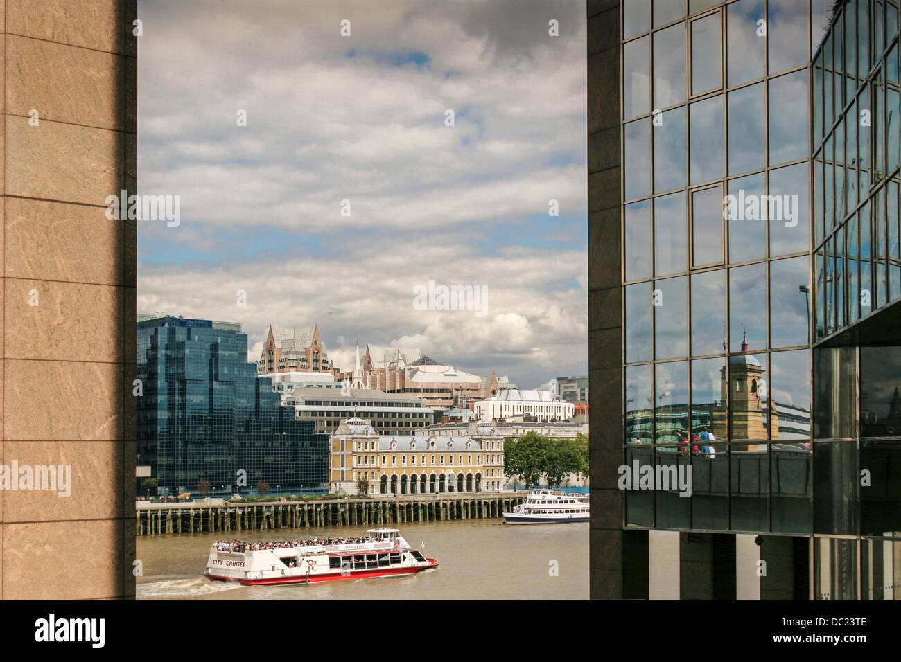 Passenger boat, River Thames, London, viewed through archway of ...