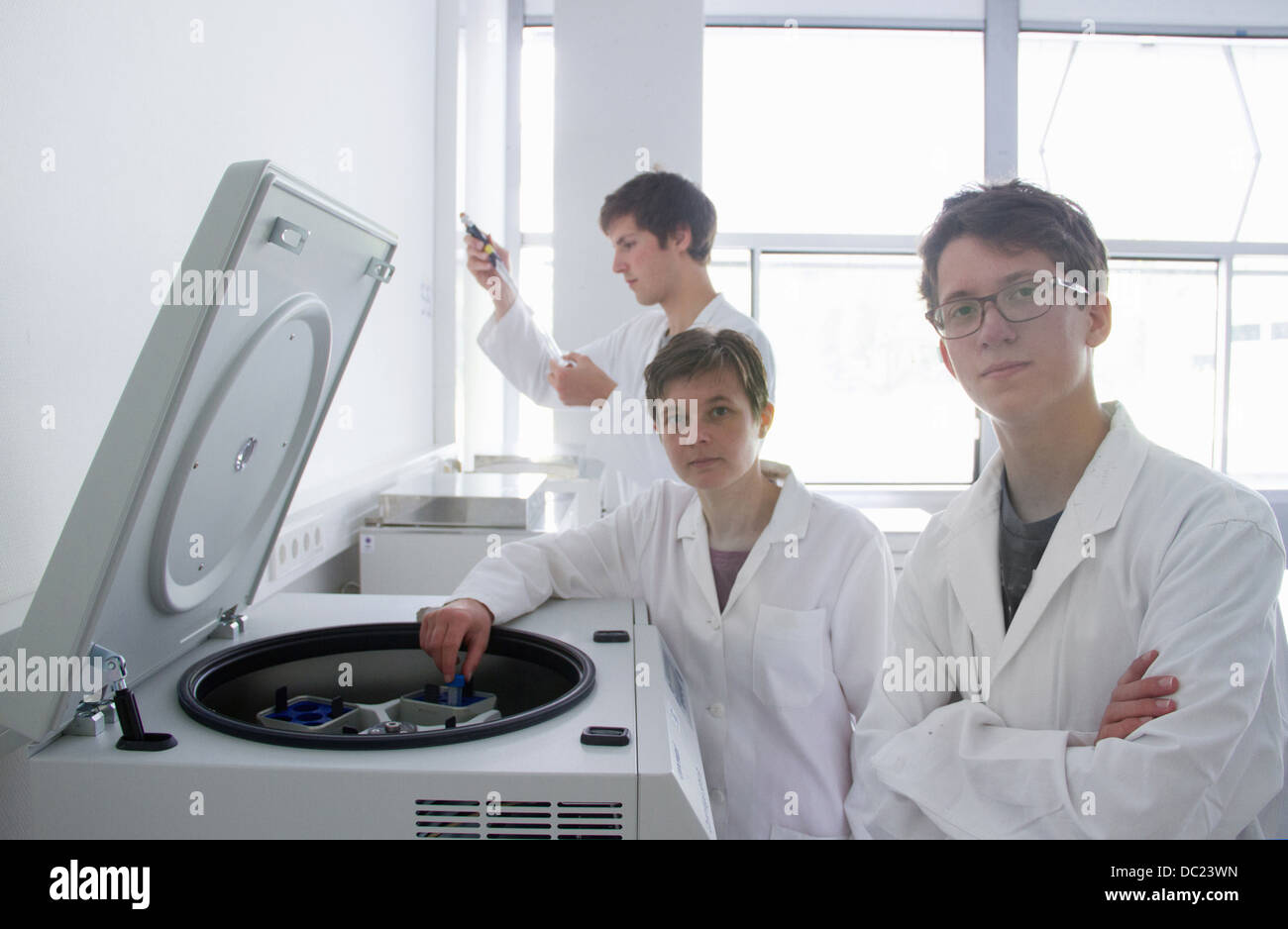 Scientists working in laboratory Stock Photo - Alamy