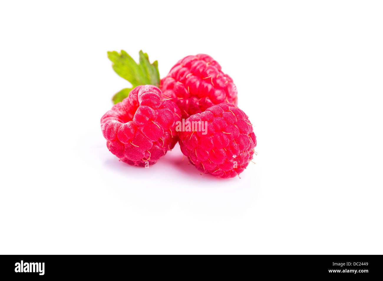 Ripe raspberries isolated on a white background Stock Photo - Alamy