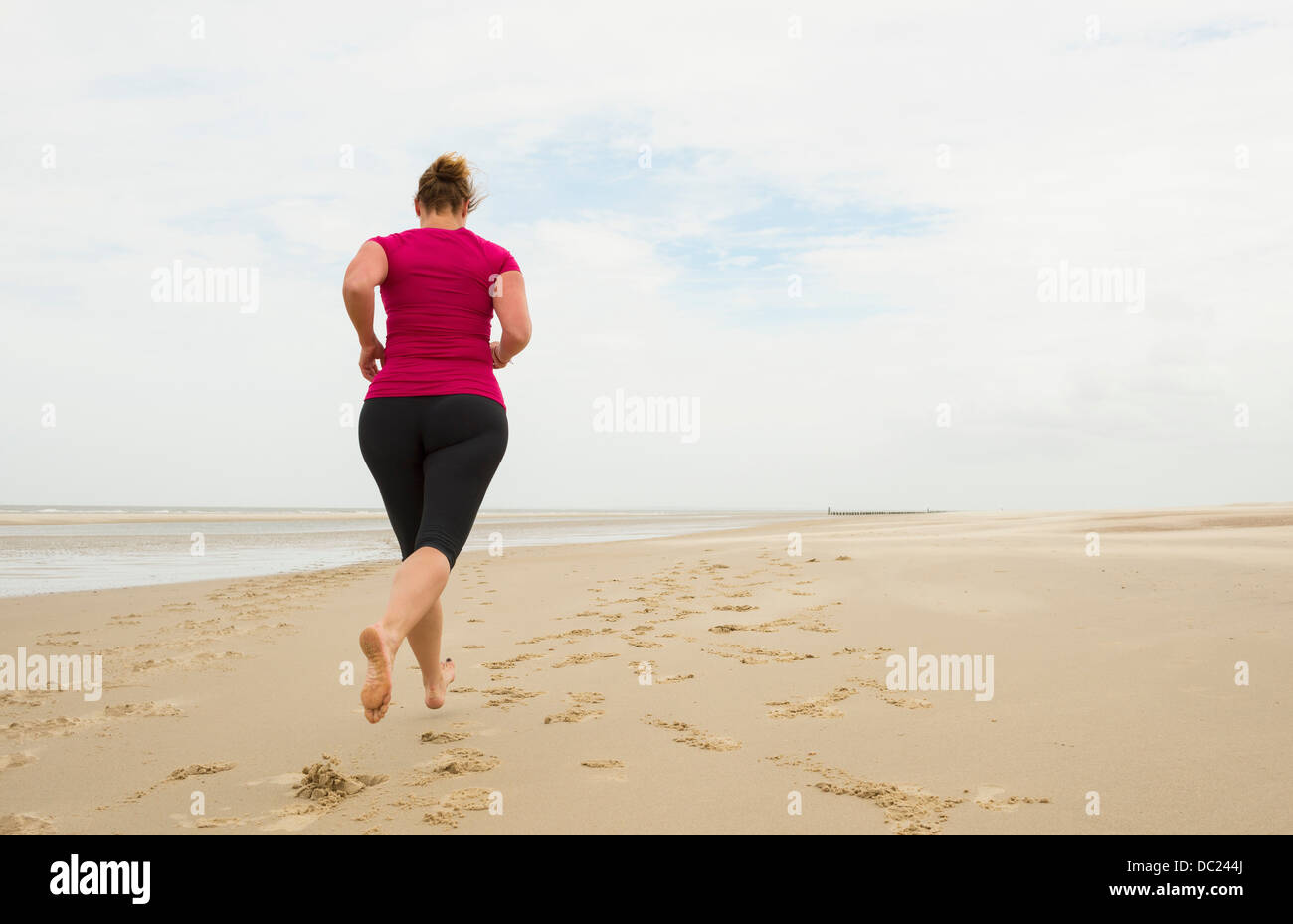 Woman Running Beach Beach High Resolution Stock Photography and Images ...