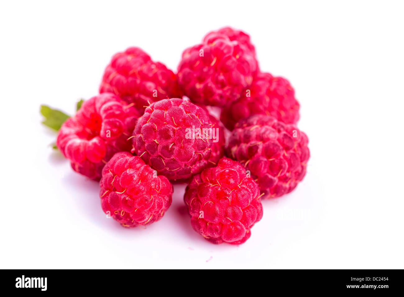 Ripe raspberries isolated on a white background Stock Photo - Alamy