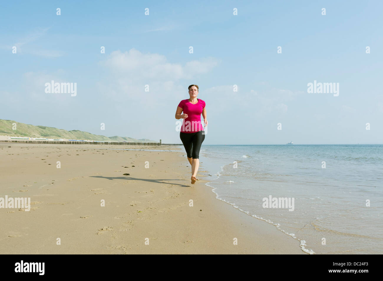 Woman on beach woman on beach hi-res stock photography and images - Alamy