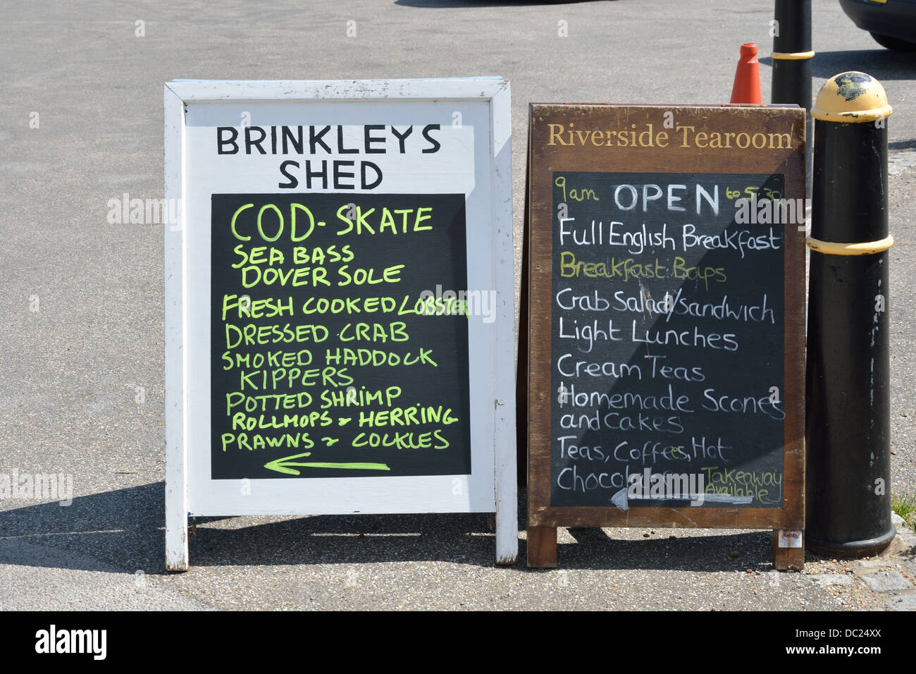 Two fish for sale signs Stock Photo - Alamy