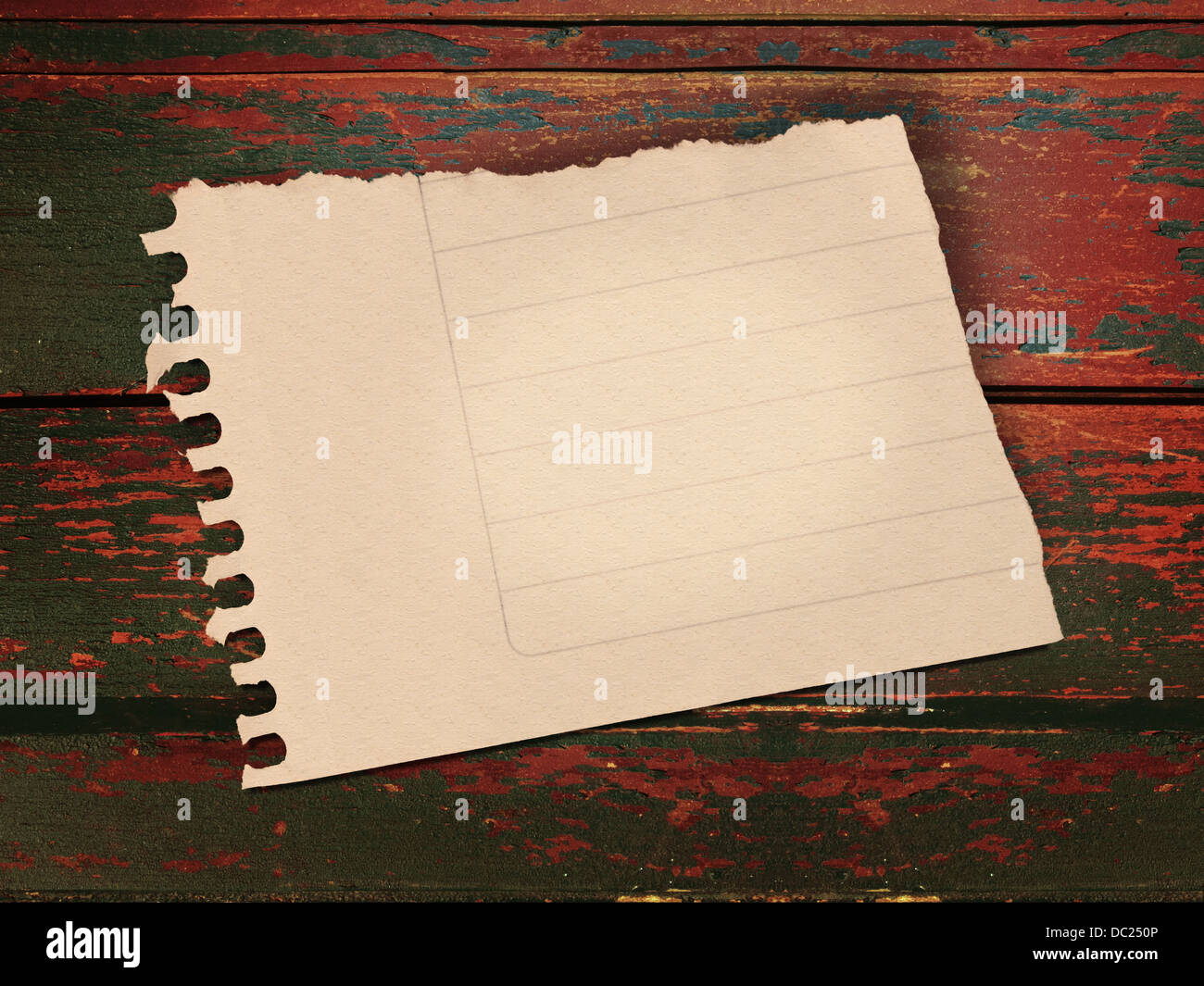 Vintage paper note over grunge wood Stock Photo - Alamy