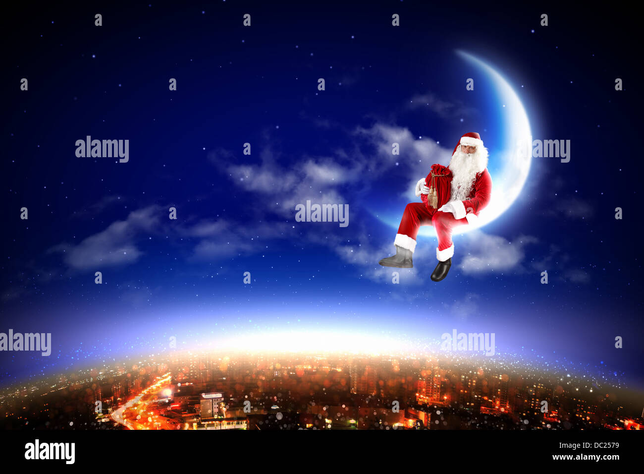 Santa on the moon Stock Photo - Alamy