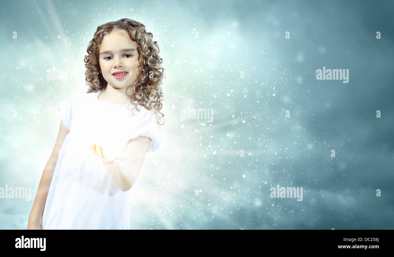 Child with magic light Stock Photo - Alamy