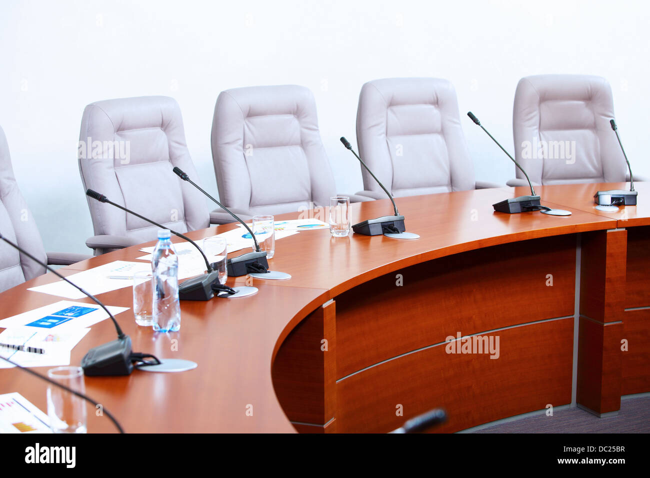 Conference hall with microphones Stock Photo - Alamy