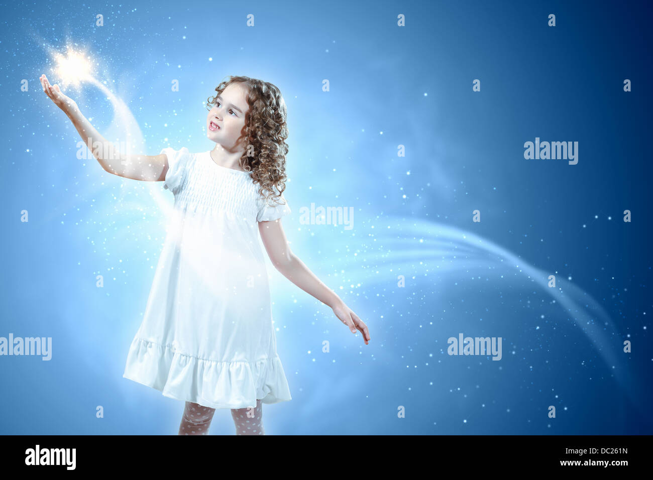 Child with magic light Stock Photo - Alamy