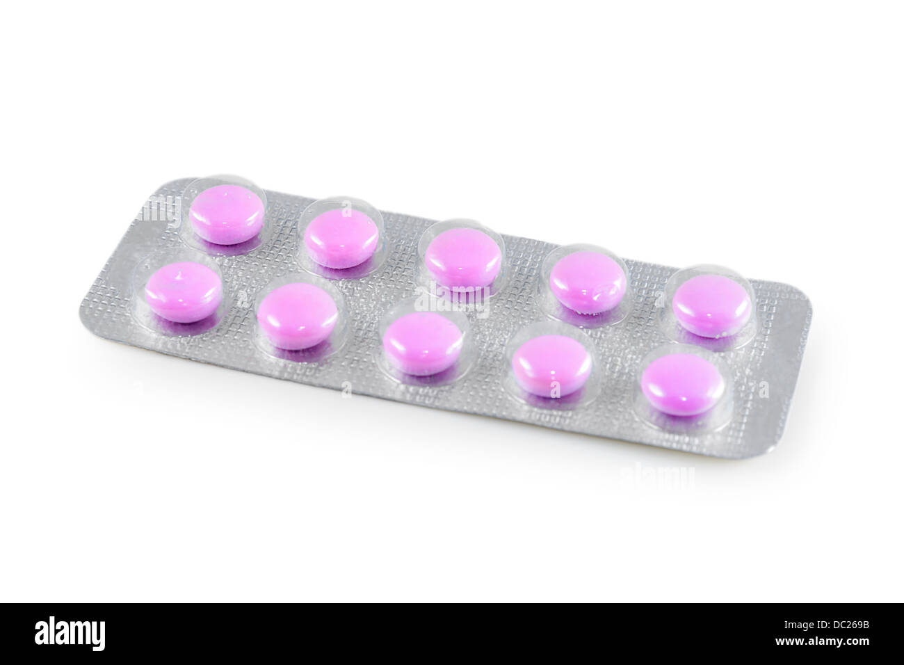 The pink pills in a shiny package Stock Photo - Alamy