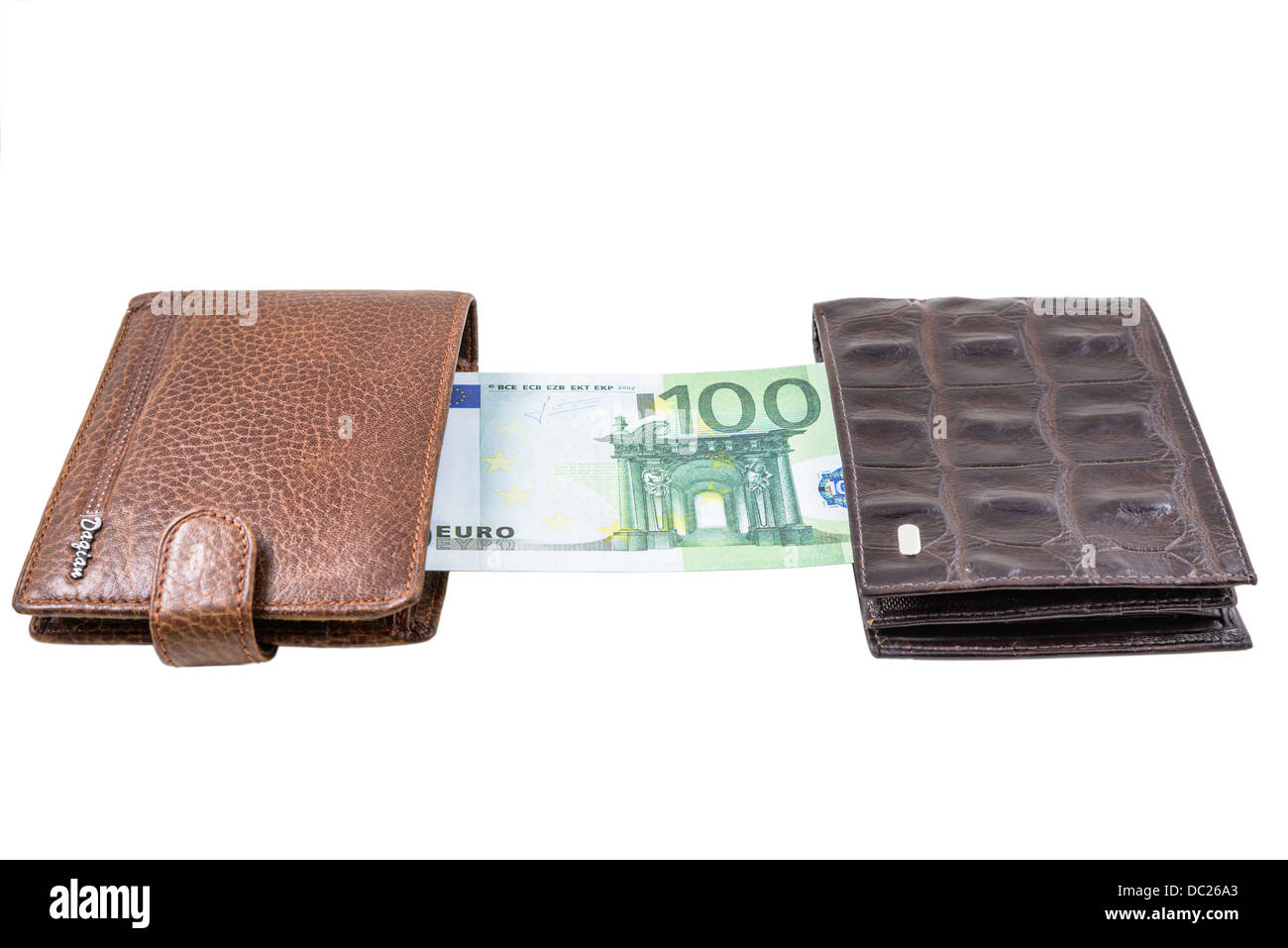 The two brown leather wallet with euro is photographed on the close-up ...