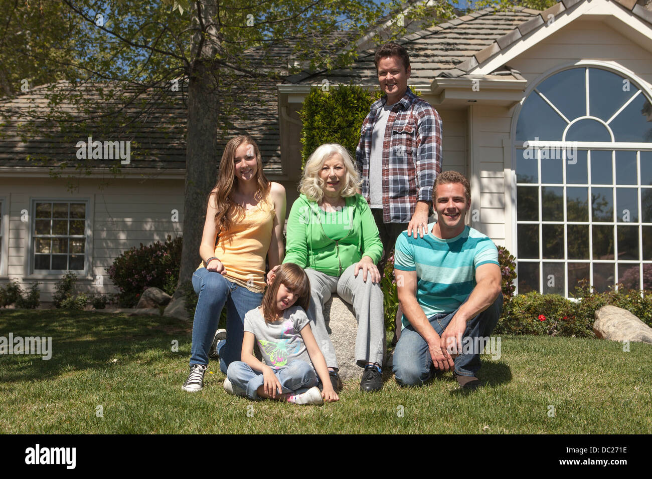Portrait of three generation family in garden Stock Photo - Alamy