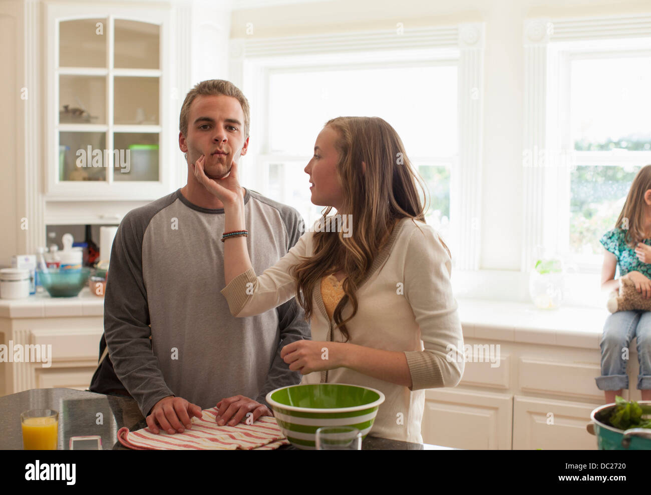 Squeezing cheeks hi-res stock photography and images - Alamy