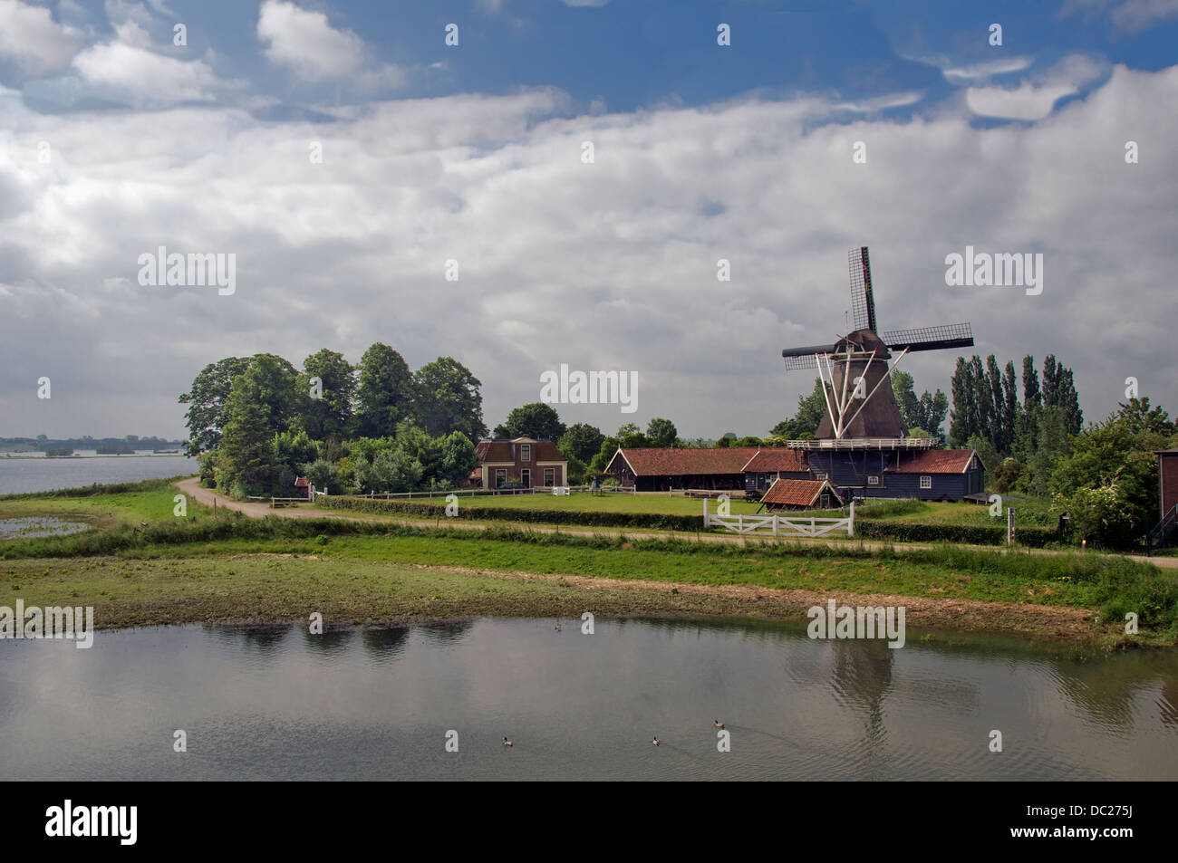 Windmill on Issel River Deventer Holland Stock Photo - Alamy