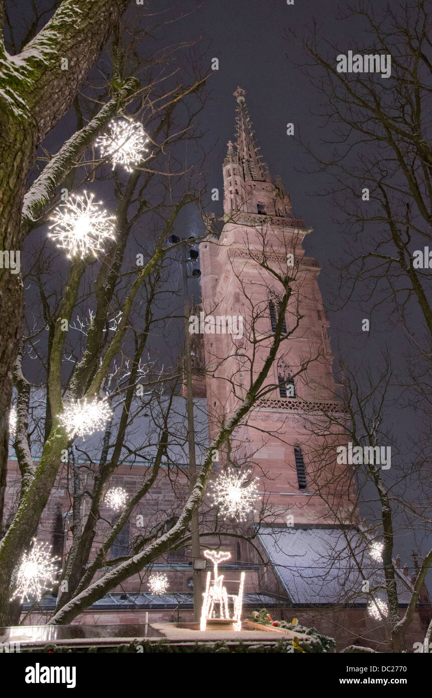 Switzerland, Basel. Historic church at Munsterplatz Winter Holiday ...