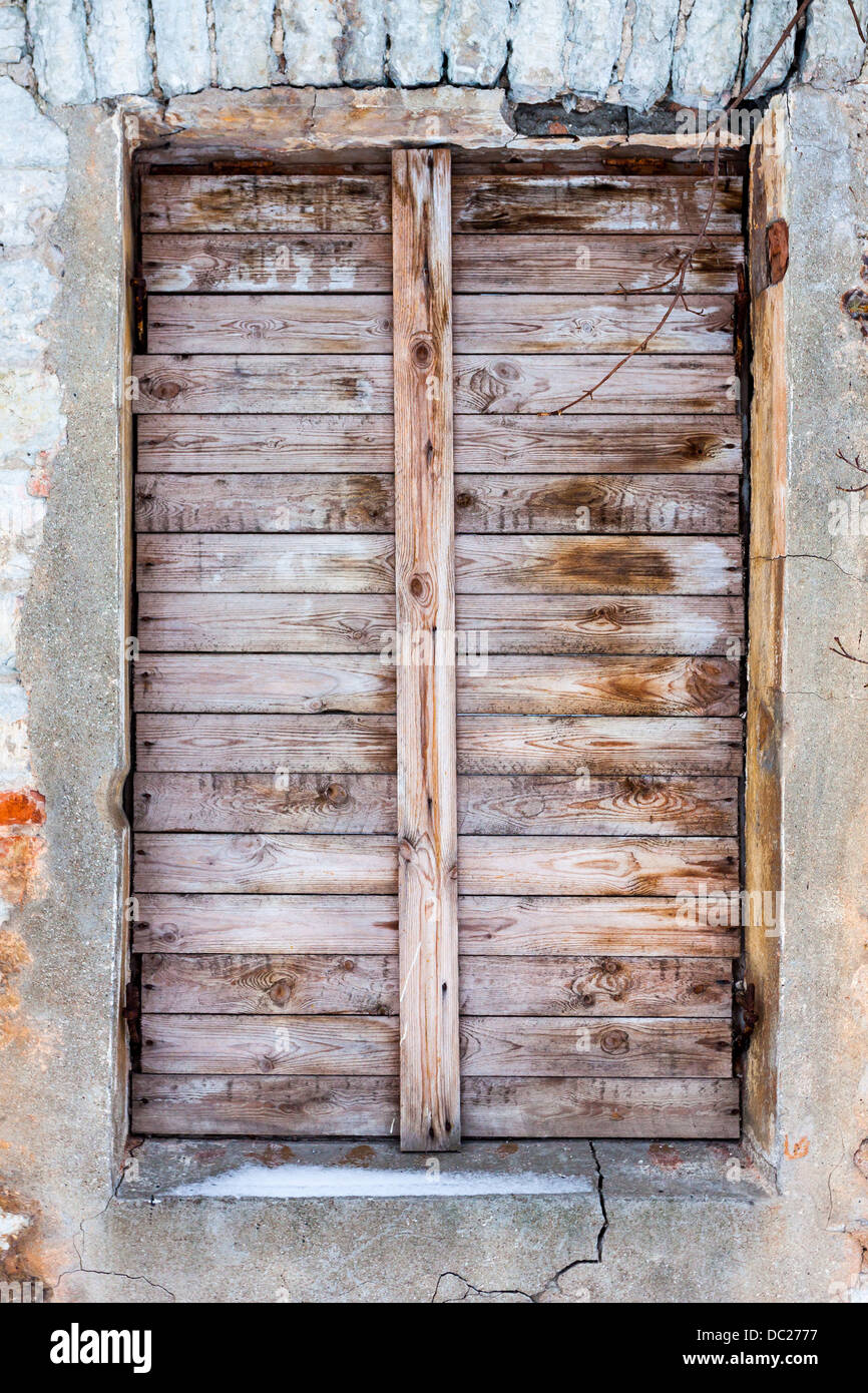 old house with boarded up wooden window Stock Photo - Alamy