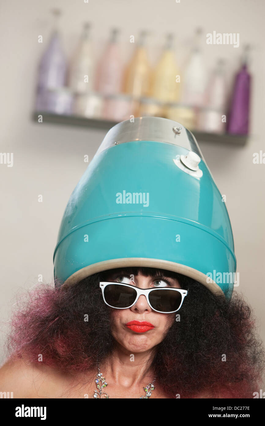 Lady in Large Hair Dryer Stock Photo - Alamy