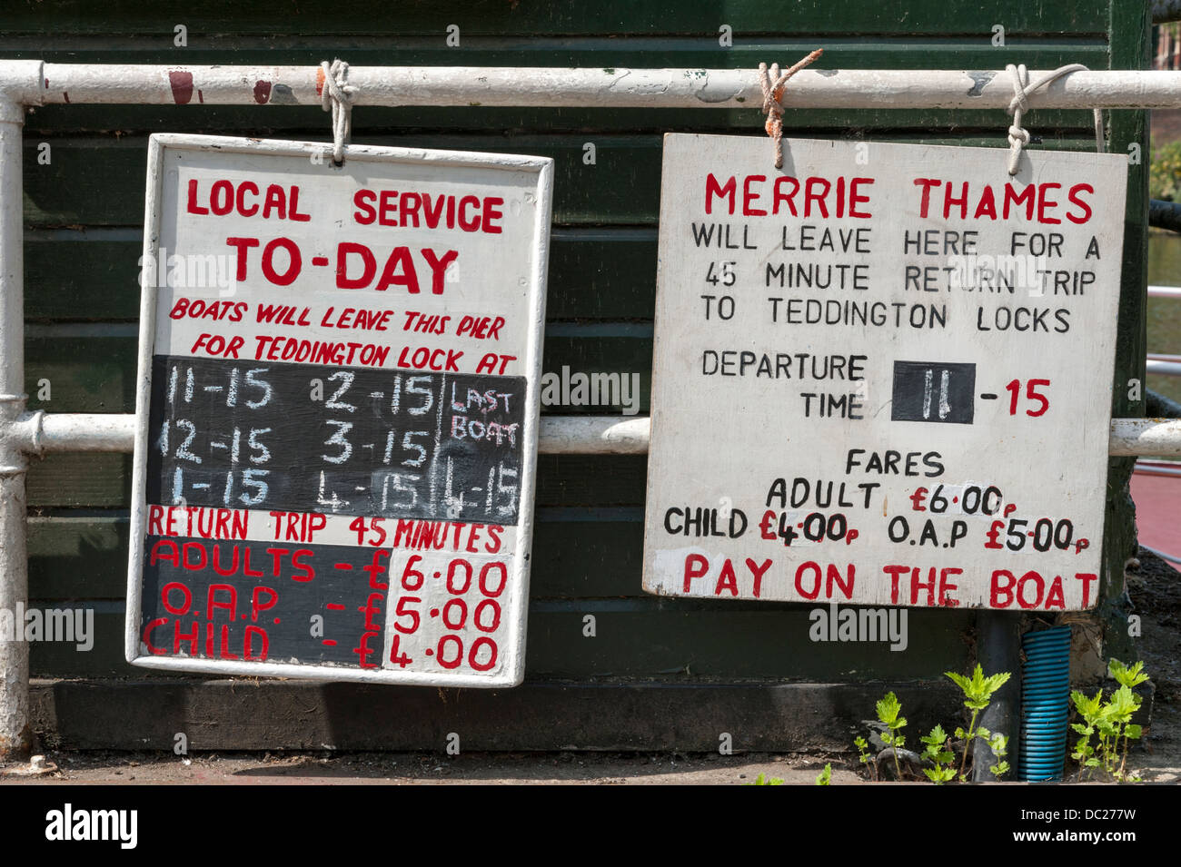 Boat trip signs on the River Thames at Richmond upon Thames Surrey ...