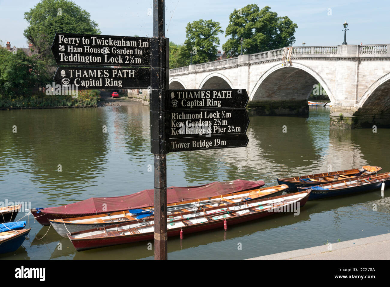 A signpost on the Thames path at River Thames at Richmond London UK ...