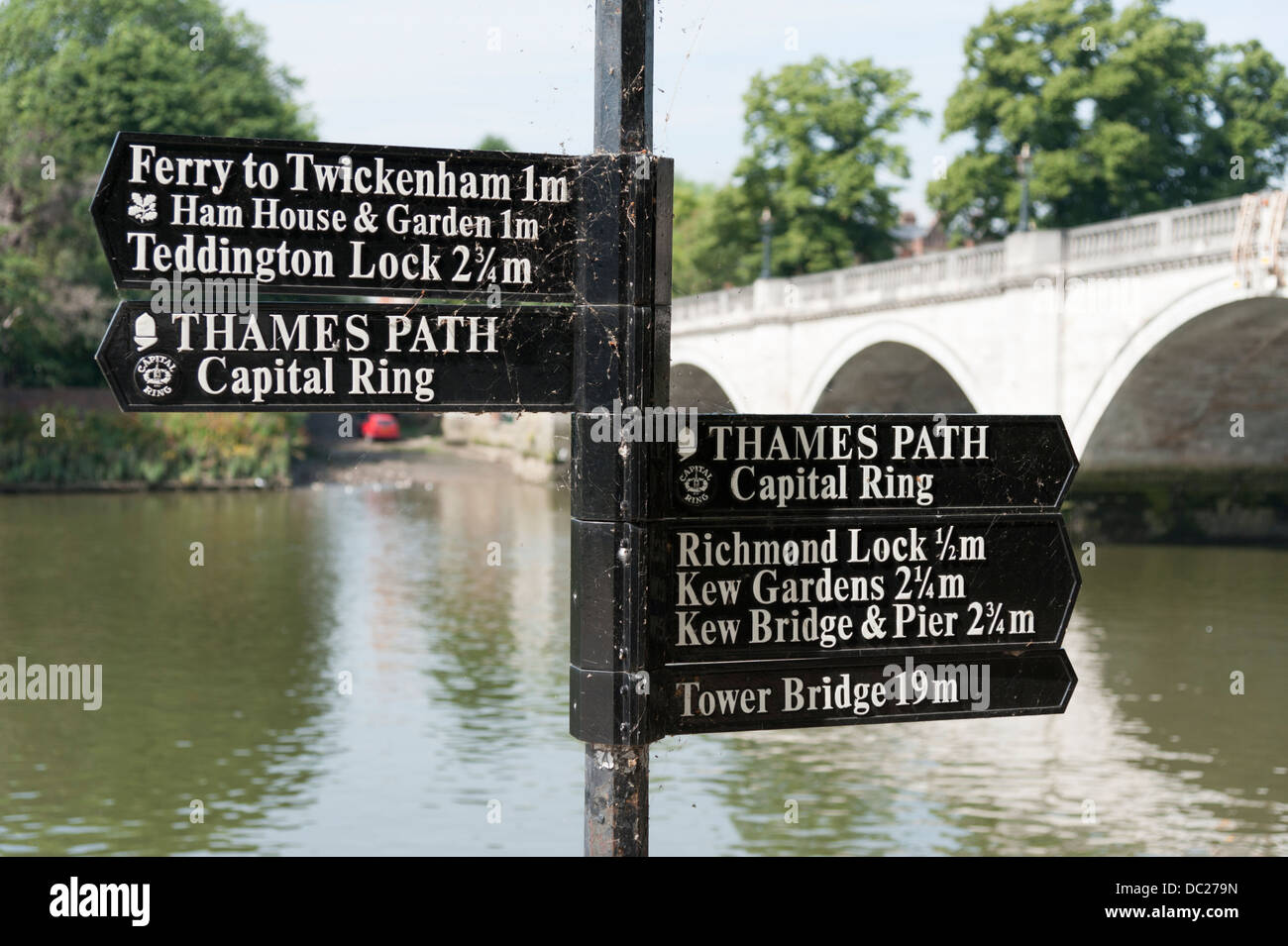 A signpost on the Thames path at River Thames at Richmond London UK ...