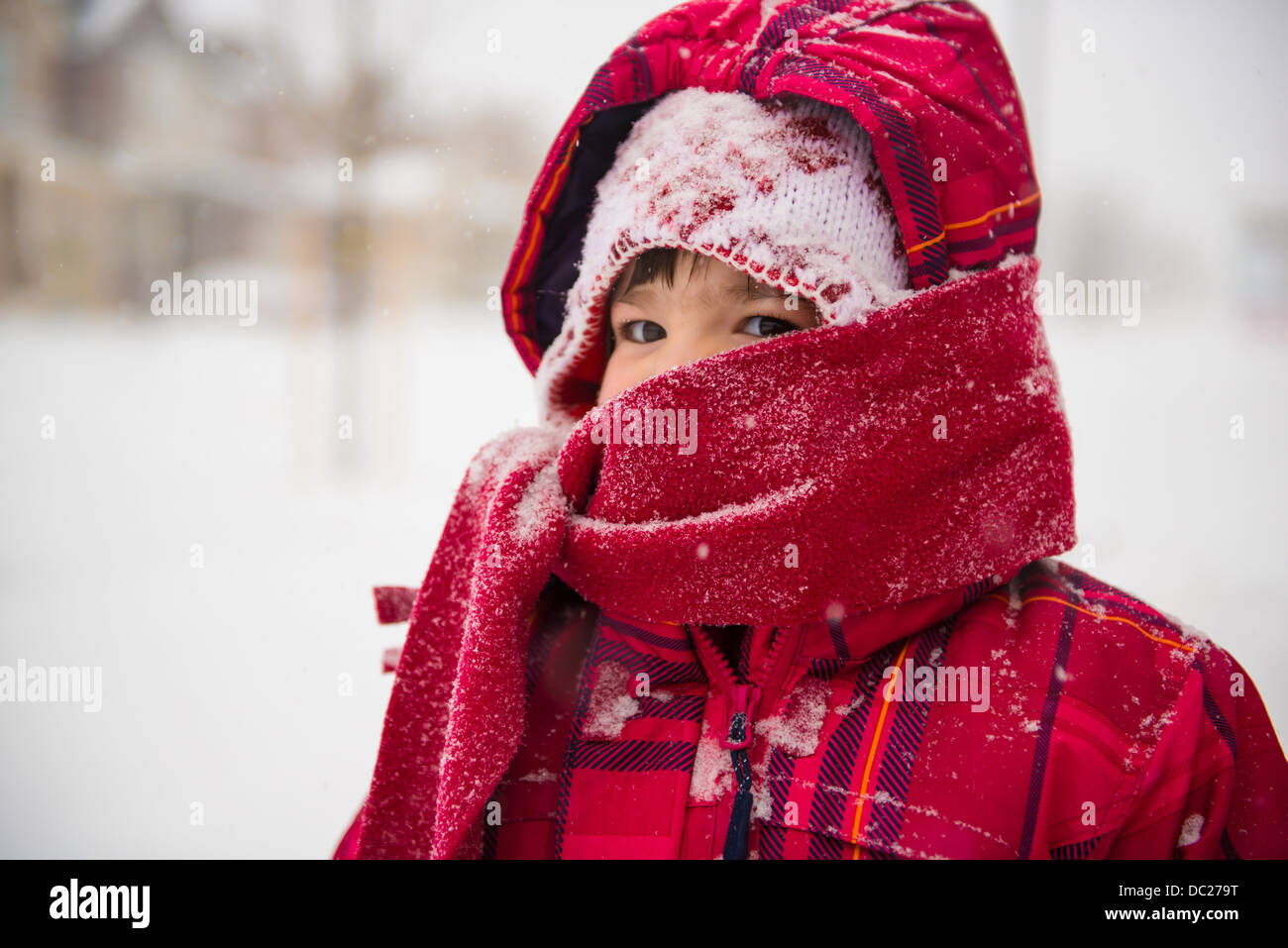 Girl wearing coat, scarf and hat with hood Stock Photo - Alamy
