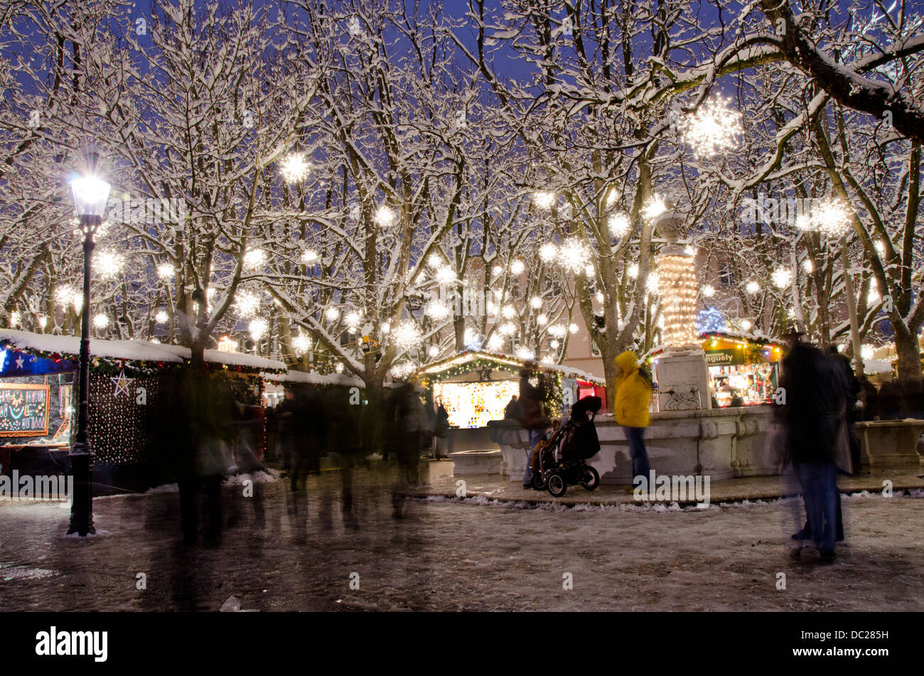 Switzerland, Basel. Munsterplatz Winter Holiday Market. Holiday lights ...