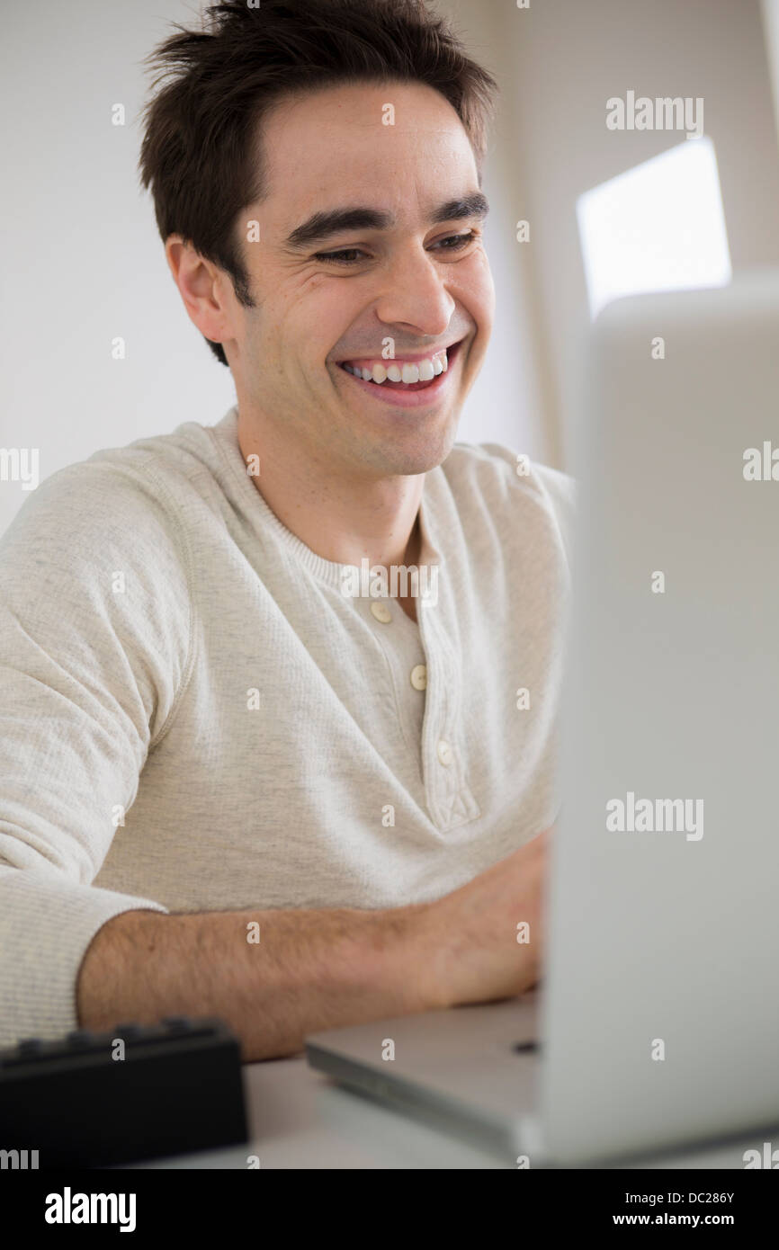 Laughing Men Laptop High Resolution Stock Photography and Images - Alamy