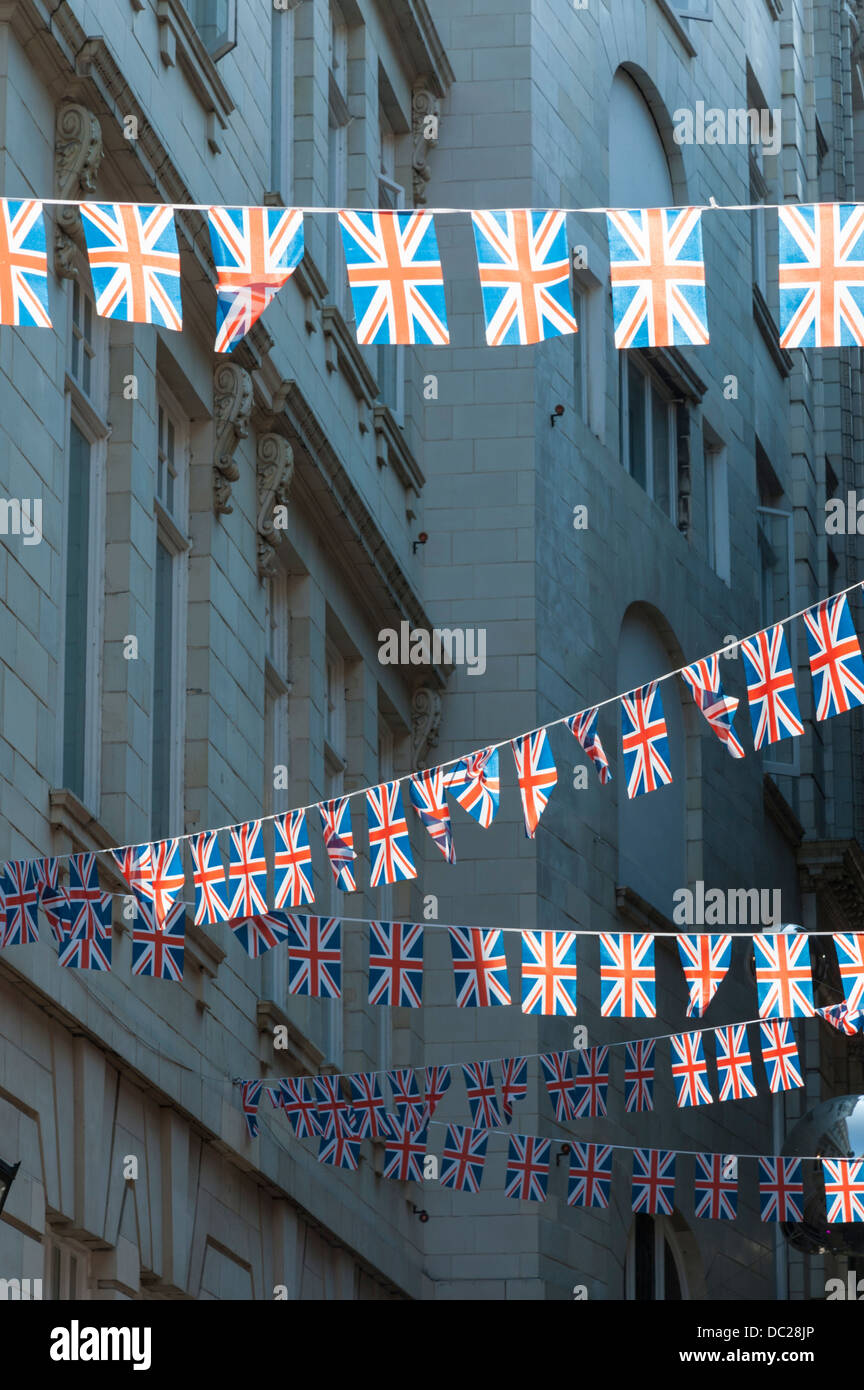 Hanging union jack flag street hi-res stock photography and images - Alamy