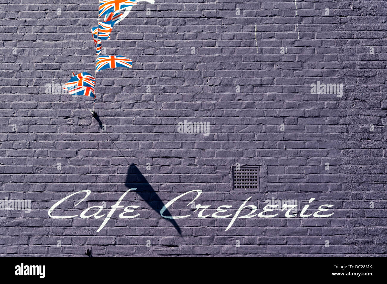 Cafe Creperie sign painted on a wall in James Street London UK Stock ...