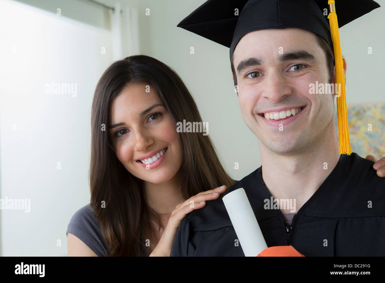 Young couple on graduation day hi-res stock photography and images - Alamy