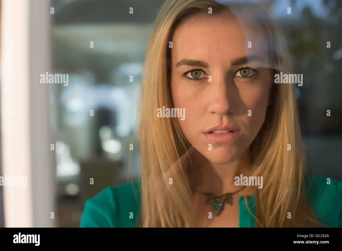 Person staring at the window hi-res stock photography and images - Alamy