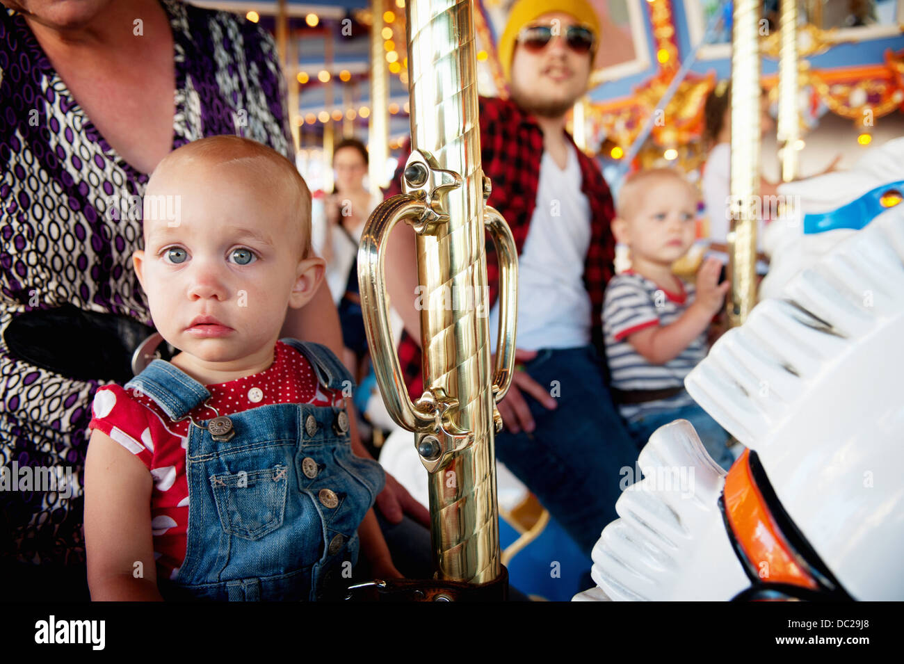 Family carousel hi-res stock photography and images - Alamy