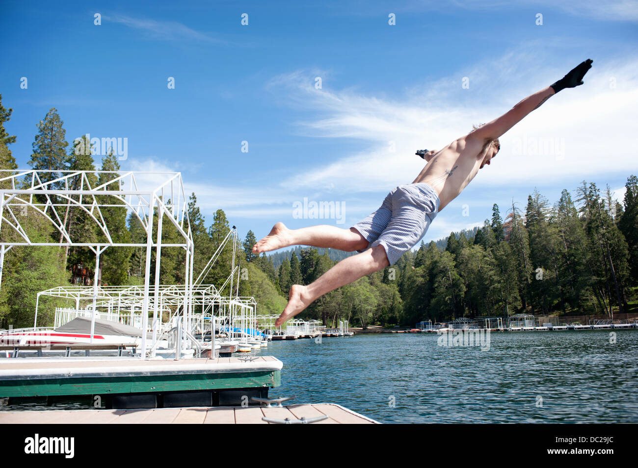 Diving off pier hi-res stock photography and images - Alamy