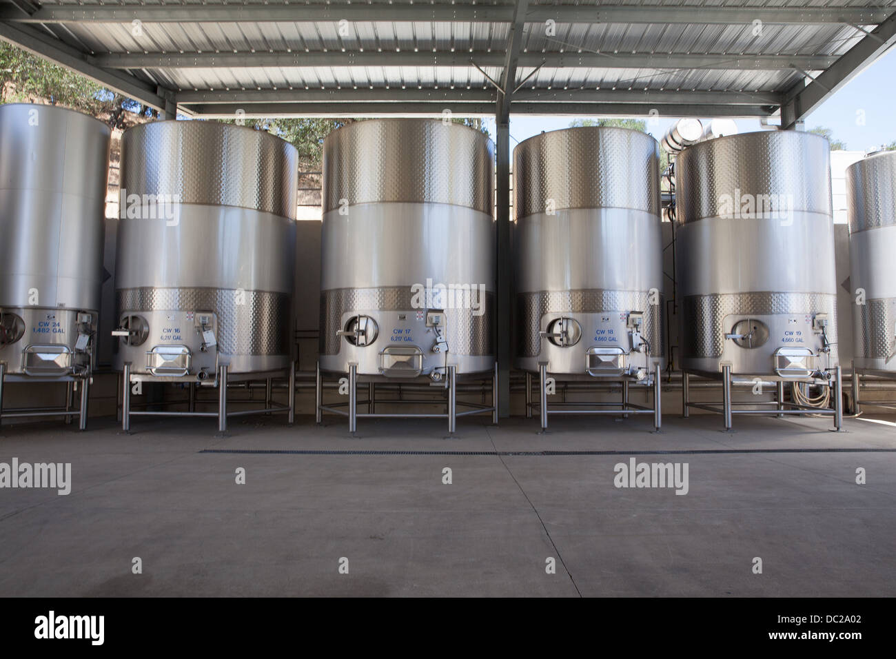 Metal vats in vineyard Stock Photo - Alamy