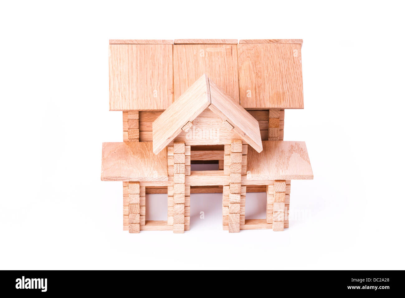 Toy wooden house isolated. Building, construction concept Stock Photo ...