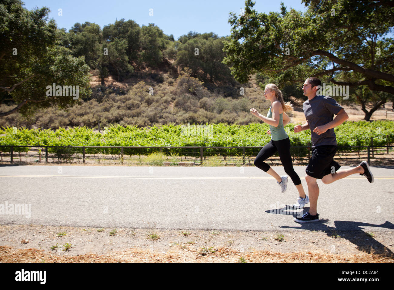 Jogging on road hi-res stock photography and images - Alamy
