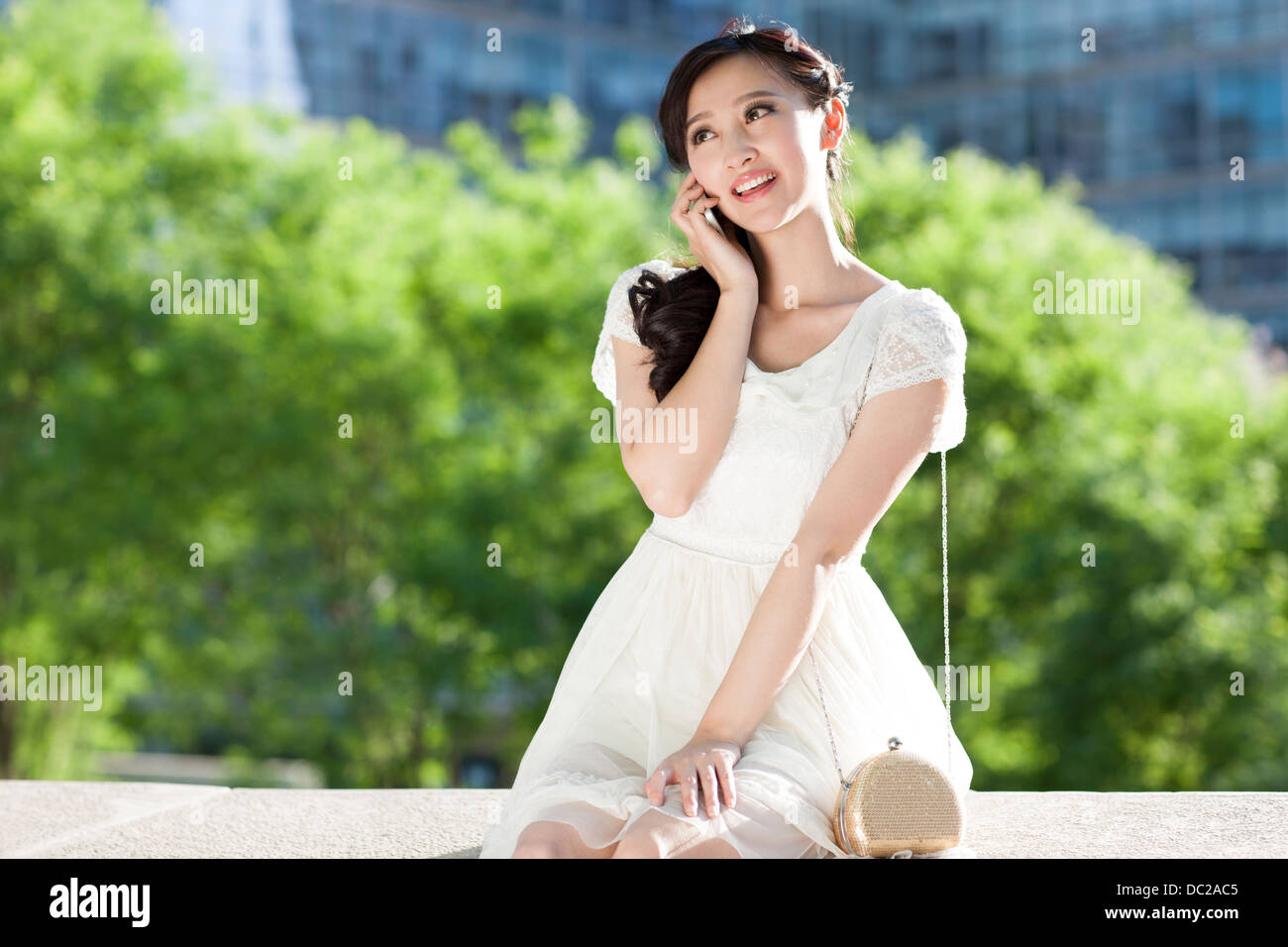 Young Chinese woman on the phone Stock Photo - Alamy