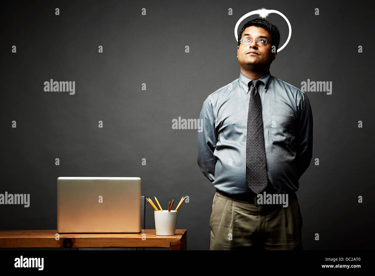 Man standing behind table hi-res stock photography and images - Alamy