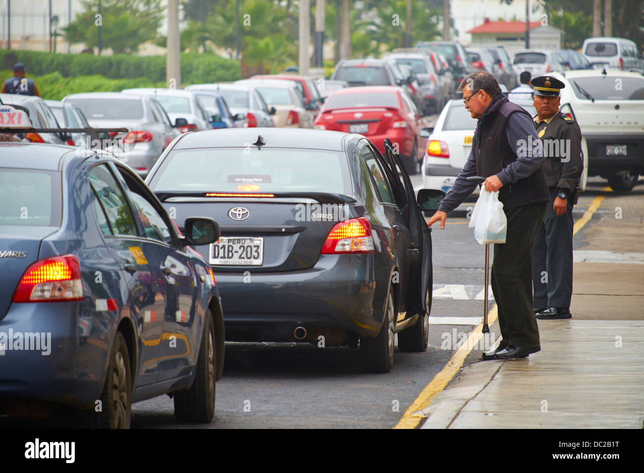 Taxi pick up outside a hotel in the Miraflores district of Lima, Peru ...
