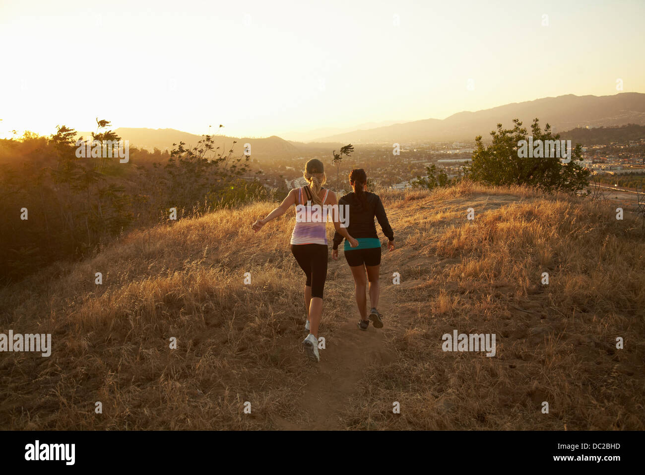 Two Young Beautiful Women Walking High Resolution Stock Photography and ...