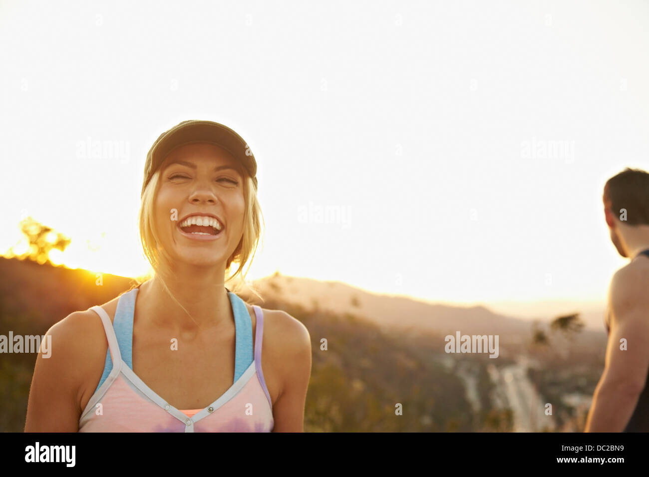 Woman laughing hard Stock Photo - Alamy