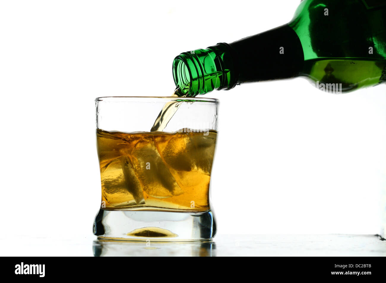whisky splash alcohol drops isolated on white Stock Photo - Alamy