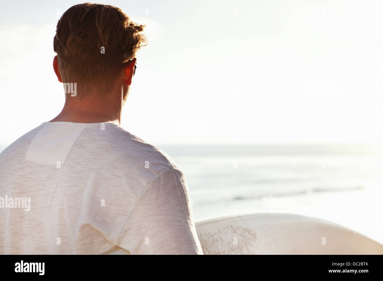 Man looking at ocean Stock Photo - Alamy