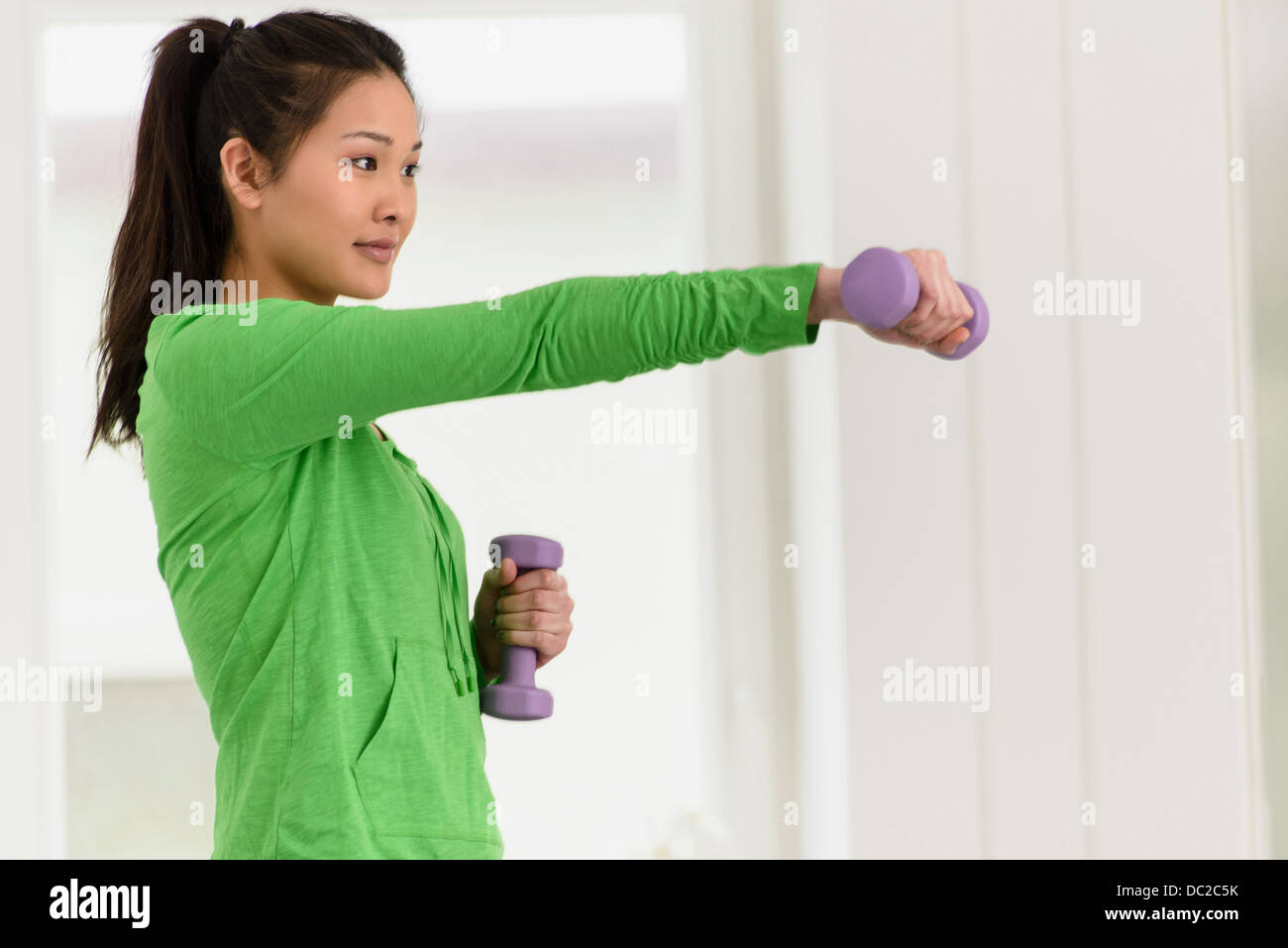 Lifting one arm hi-res stock photography and images - Alamy