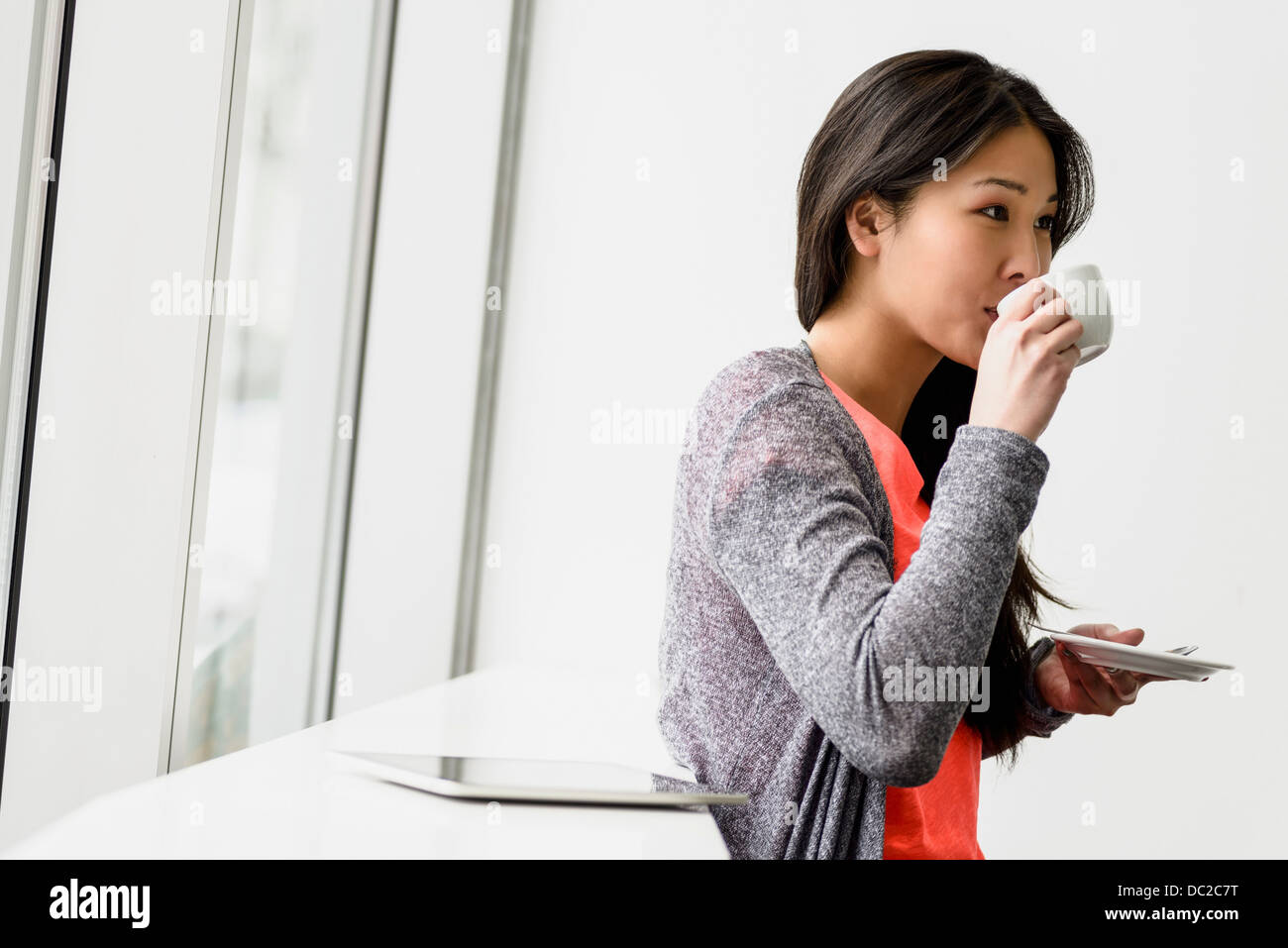 Woman having a break Stock Photo - Alamy